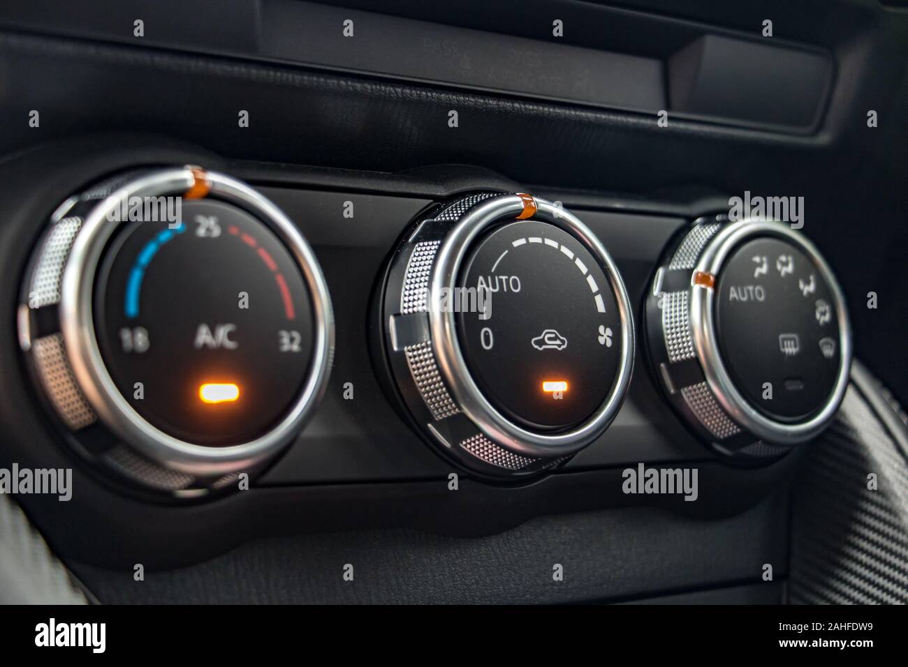 Air conditioning controls on the car dashboard. Close up car ...