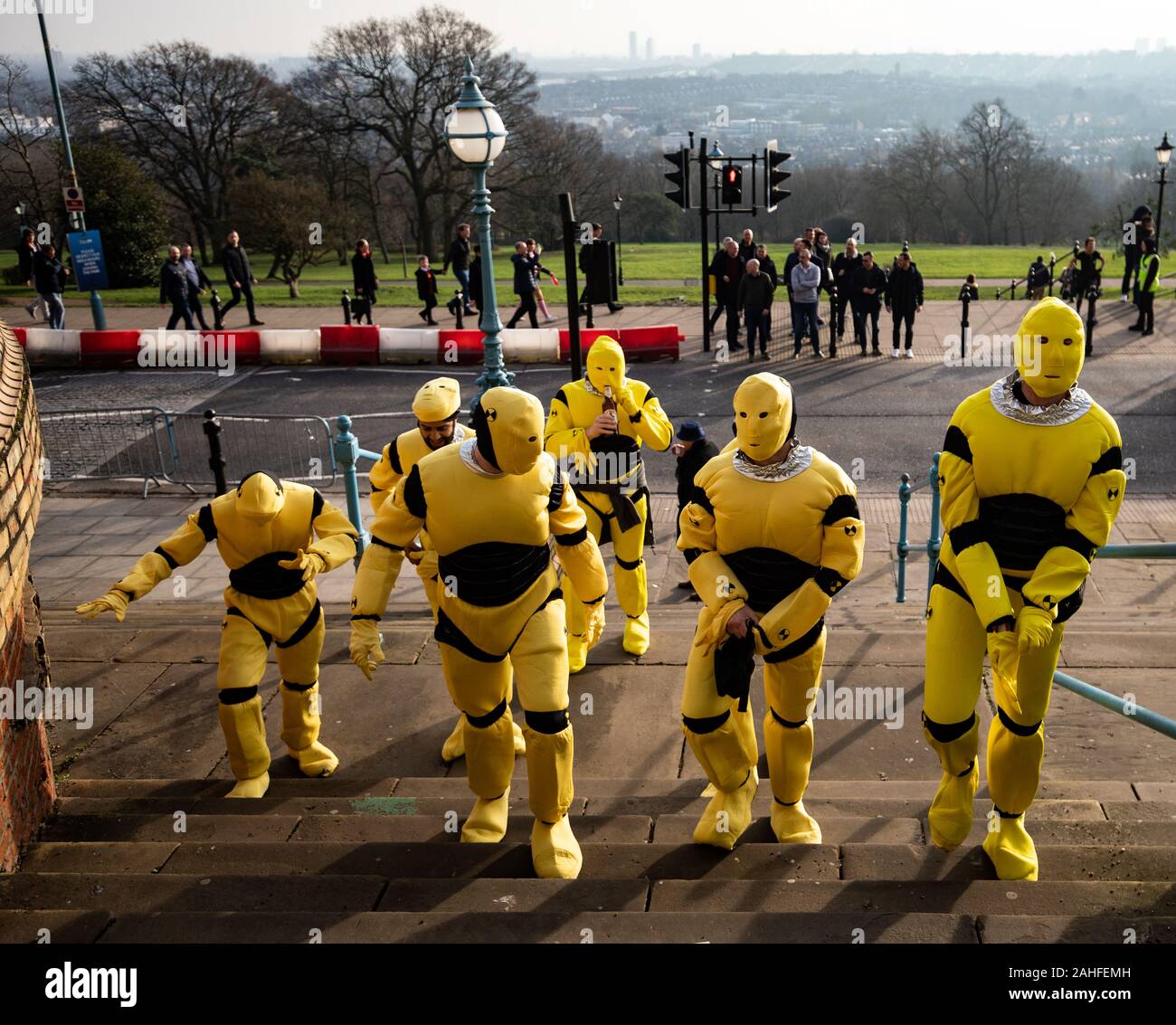 Fans in fancy dress arriving during day fourteen of the William Hill ...