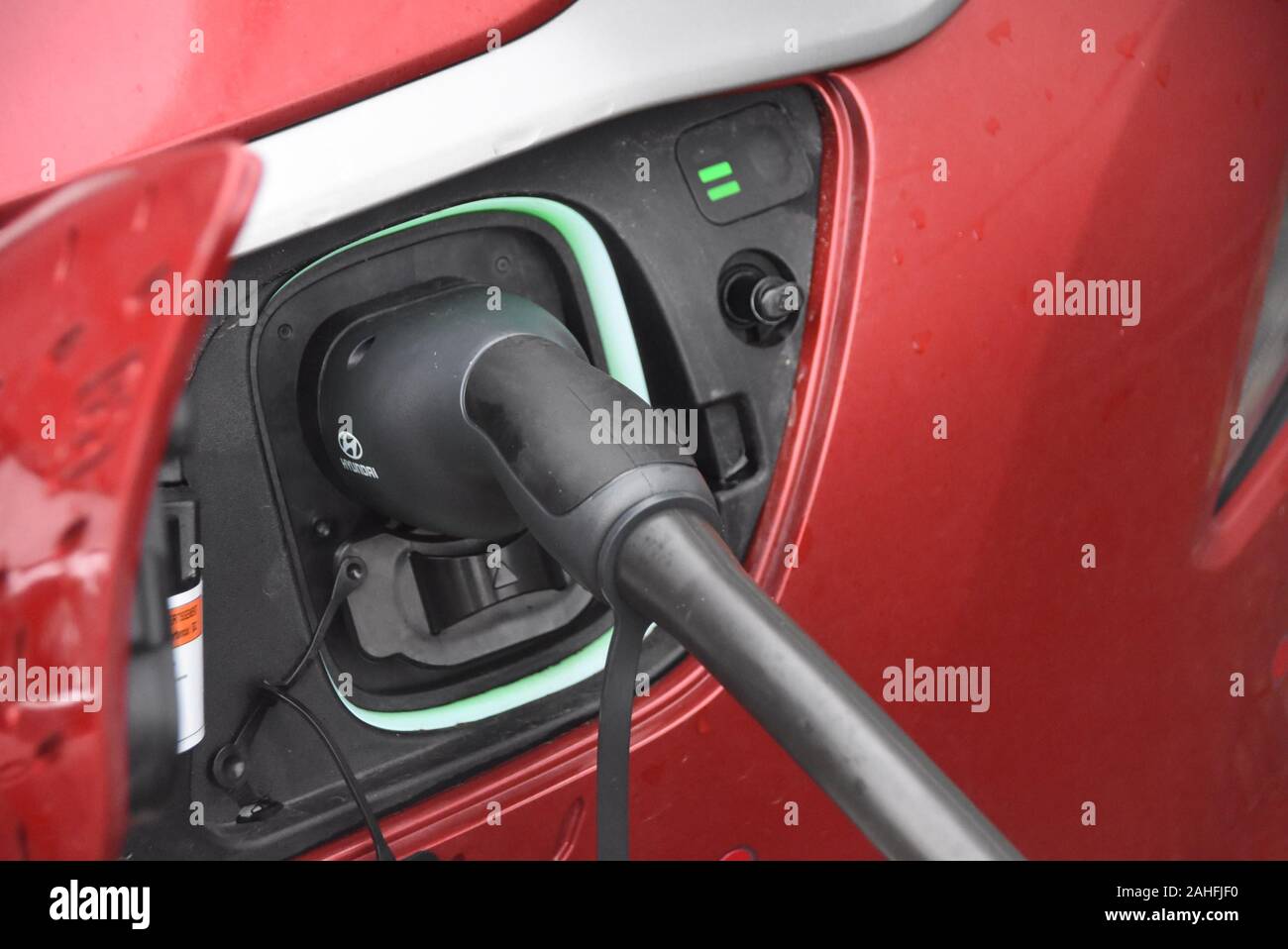 Electric car charging point sign Stock Photo - Alamy