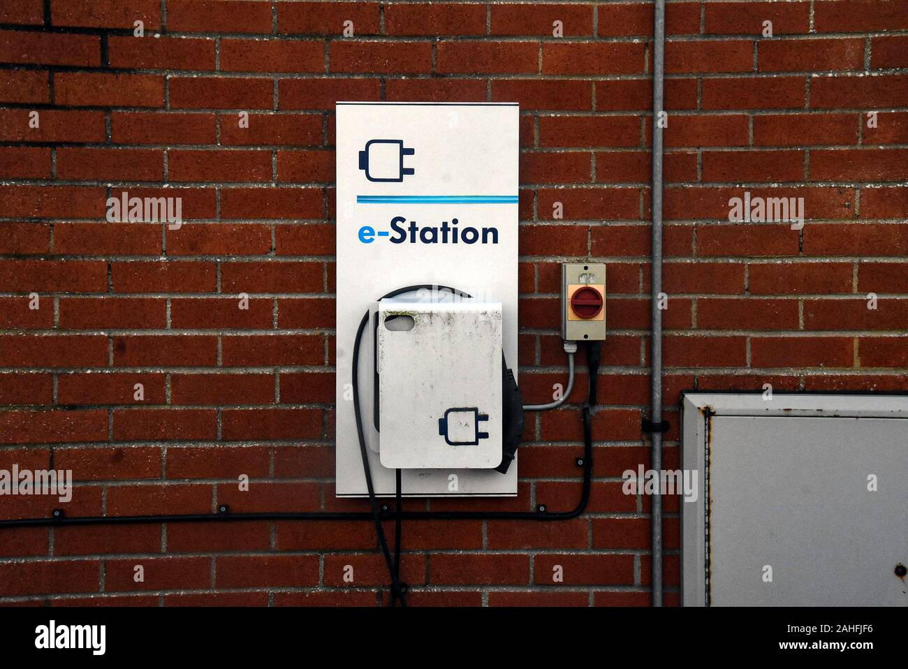 Electric car charging point sign Stock Photo - Alamy