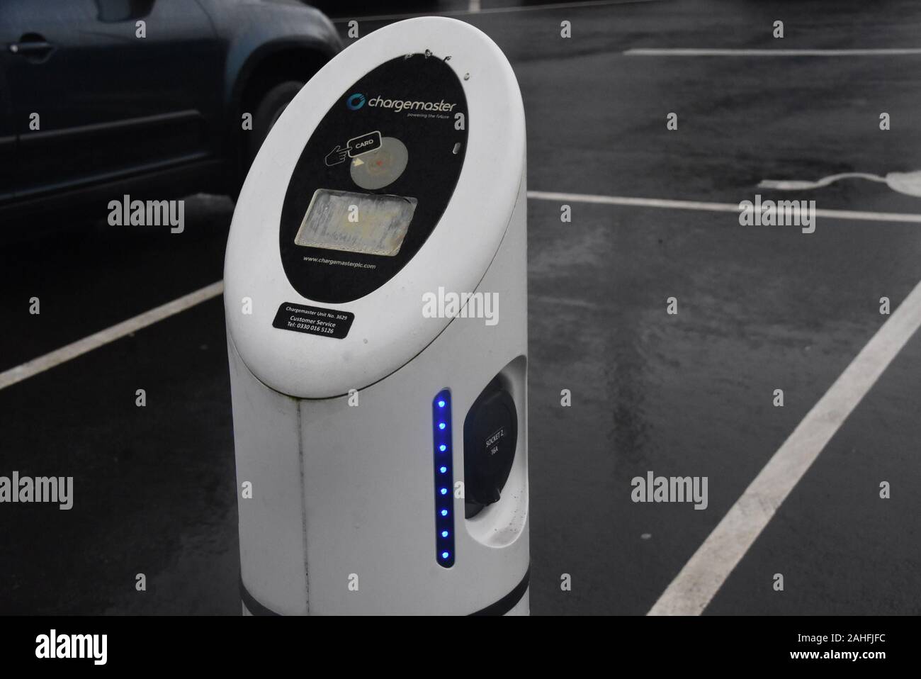 Electric car charging point sign Stock Photo - Alamy