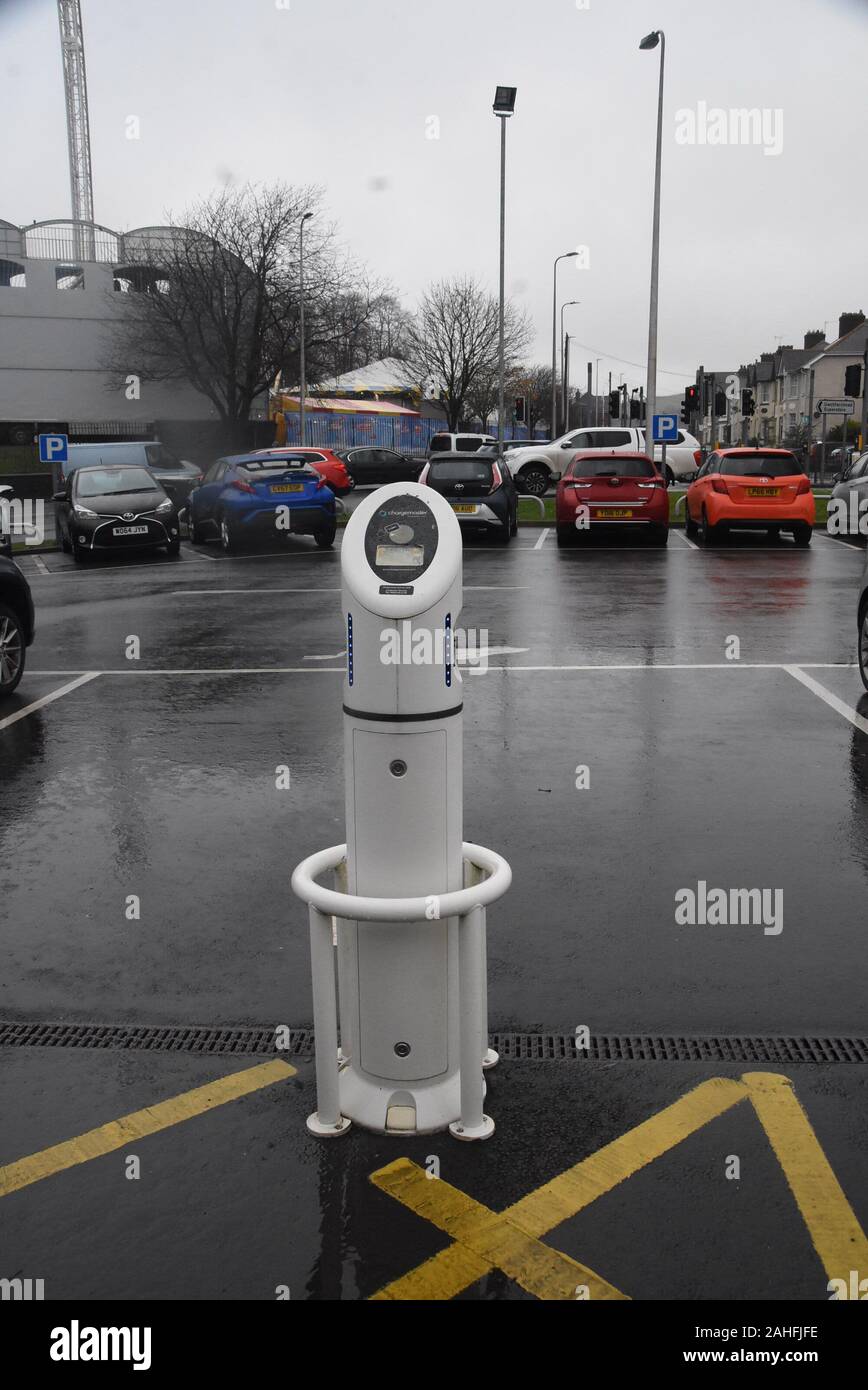 Electric car charging point sign Stock Photo - Alamy