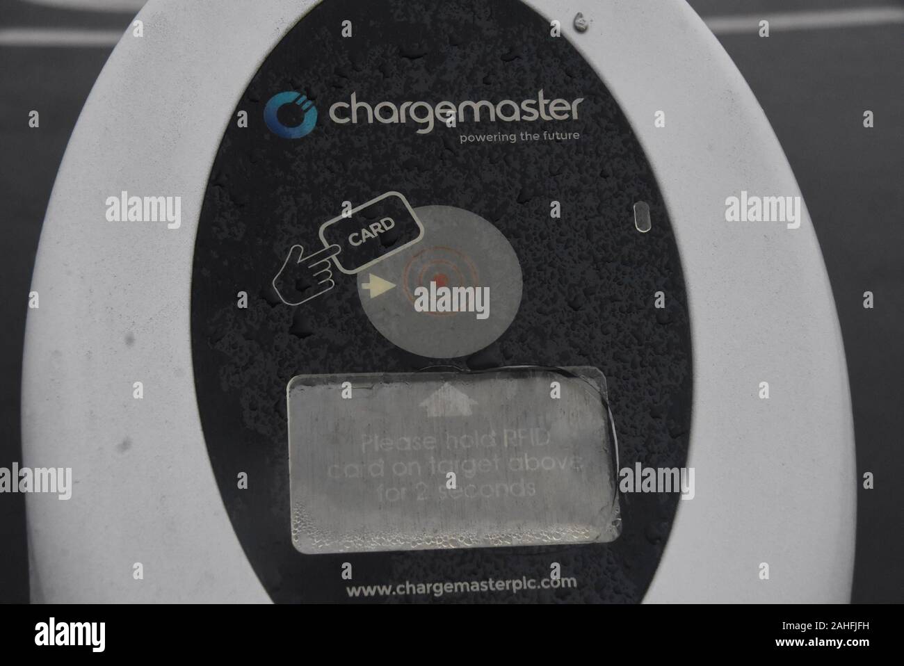 Electric car charging point sign Stock Photo - Alamy