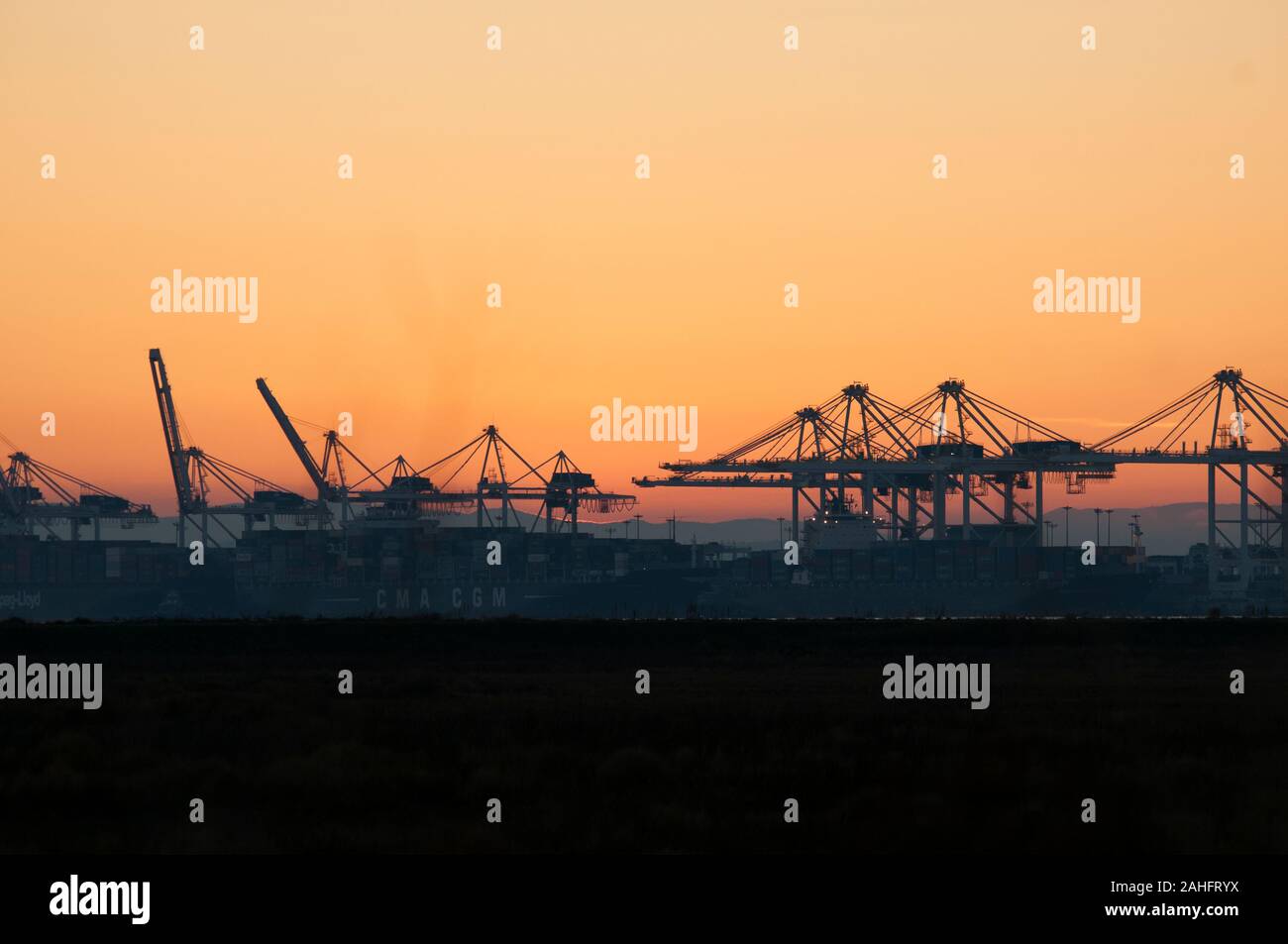 Cranes at a container port Stock Photo - Alamy
