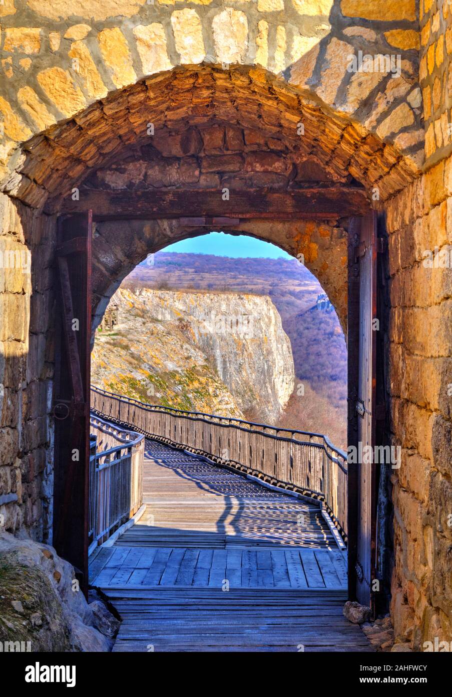 A look thru an opened stone gate of an ancient fortress Stock Photo - Alamy