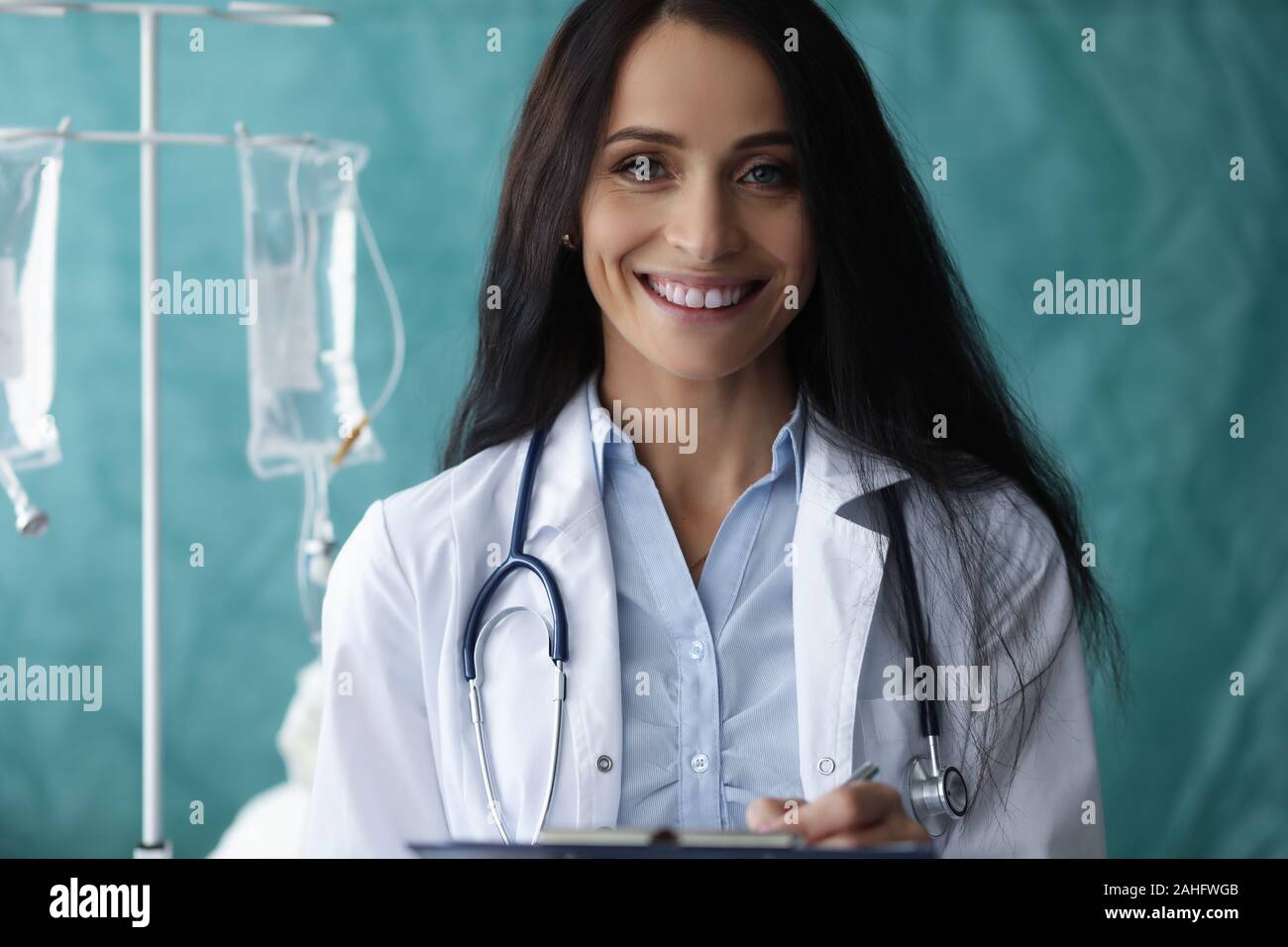 Female with stethoscope on neck Stock Photo - Alamy