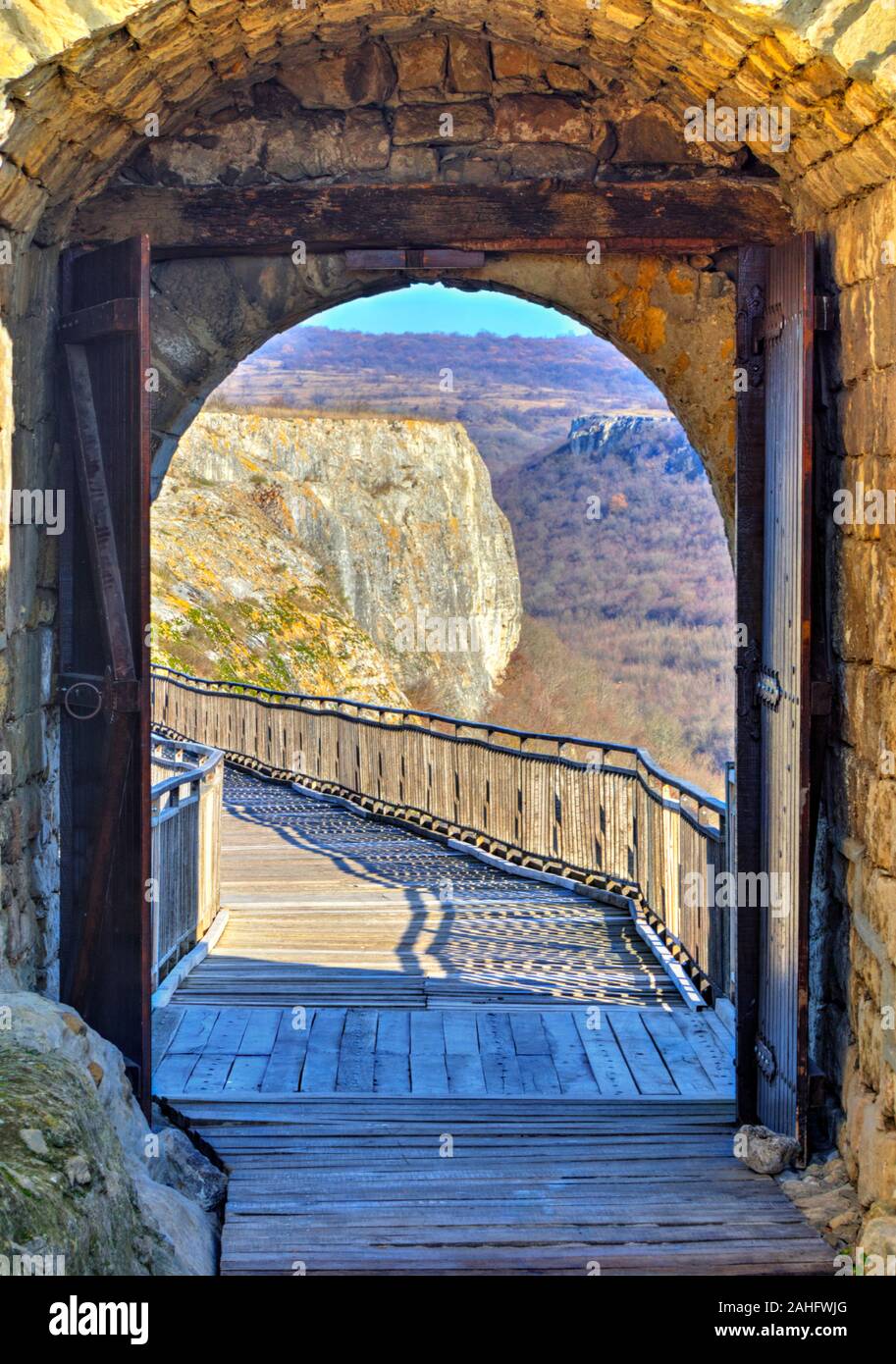 A look thru an opened stone gate of an ancient fortress Stock Photo - Alamy