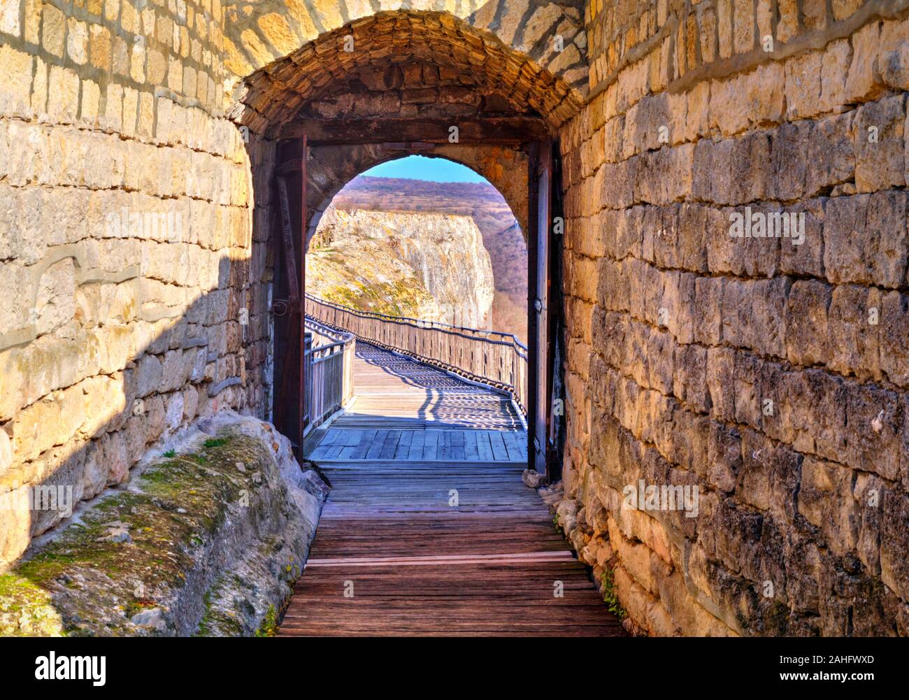 A look thru an opened stone gate of an ancient fortress Stock Photo - Alamy