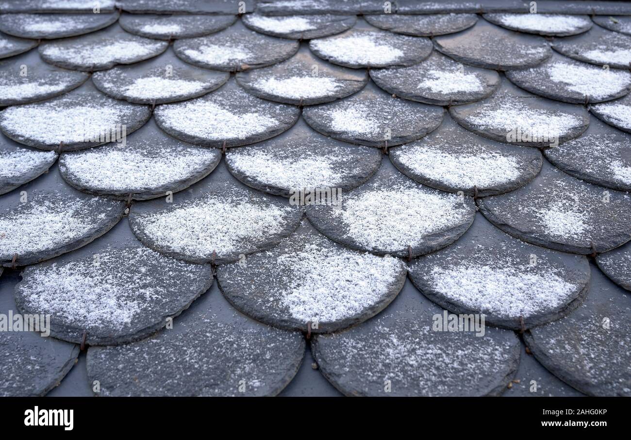 Roof tiles. Winter roof background with snow on it Stock Photo - Alamy