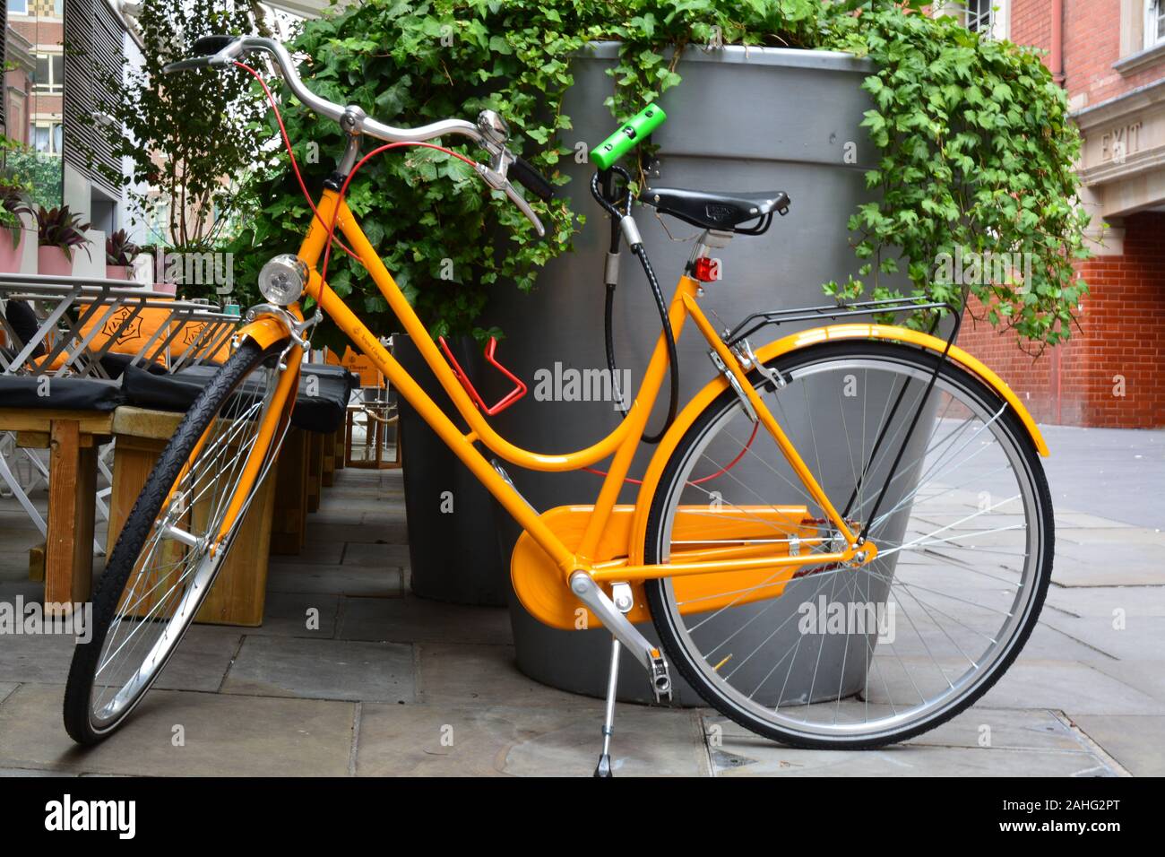 Painted orange bike hi-res stock photography and images - Alamy