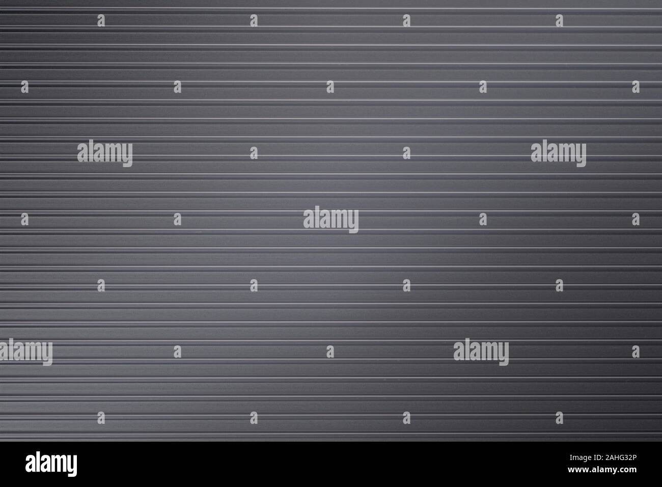 Gray ribbed metallic surface close up. Texture and background Stock ...