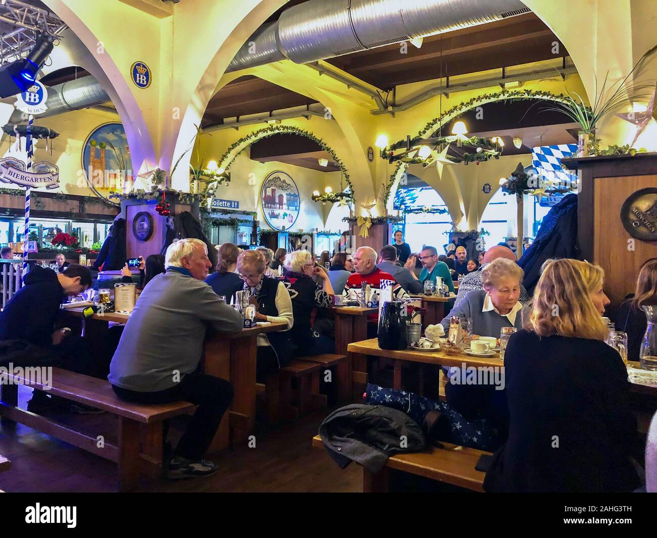 Berlin, Germany, Large Crowd People, Tourists Sharing Meals at tables ...