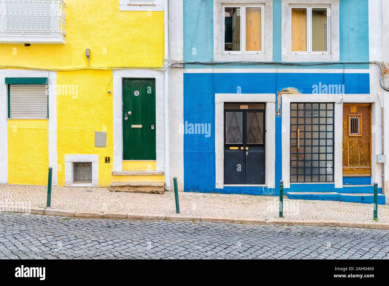 Colorful wooden doors in the facade of a typical Lisbon house, Portugal ...