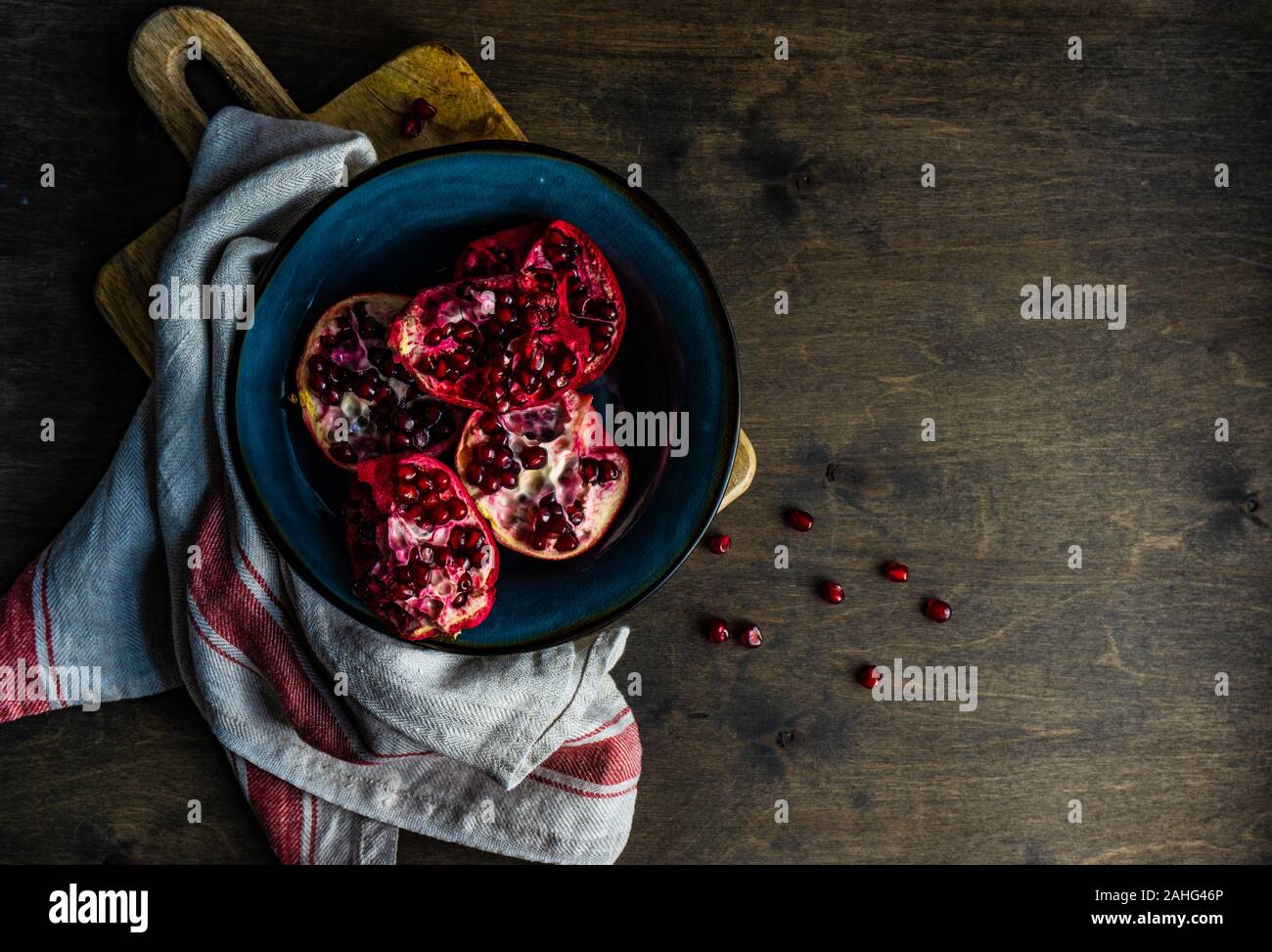 Organic food concept with fresh and ripe pomegranate on rustic ...