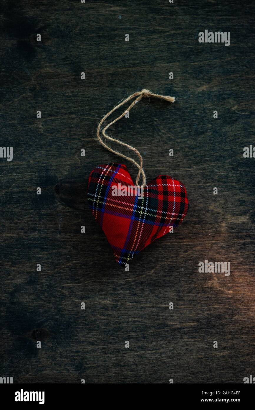 St. Valentine card concept with heart shaped decor on wooden background ...