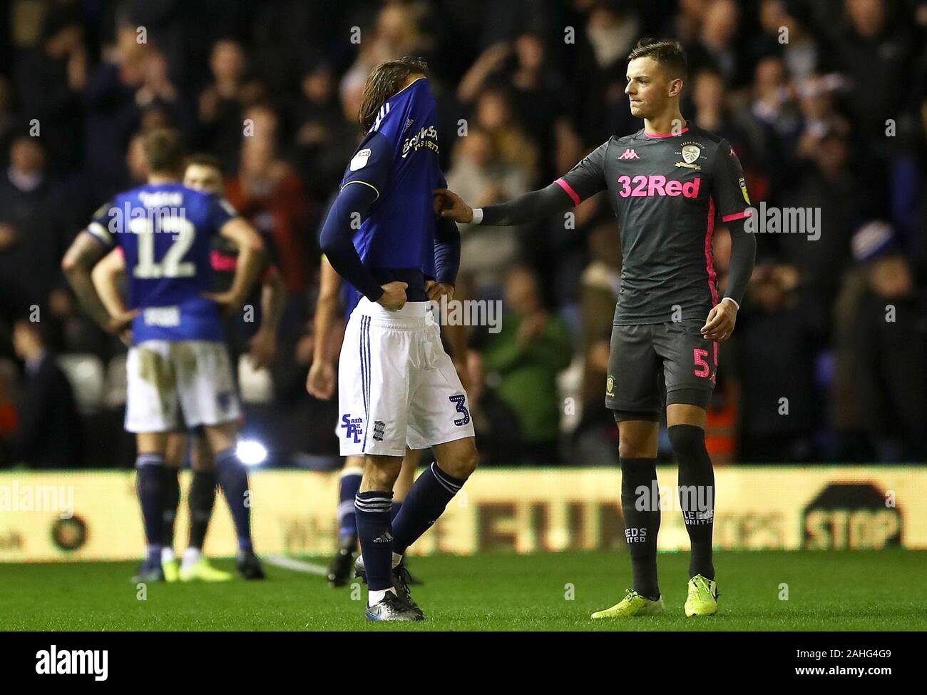 Birmingham City's Ivan Sunjic (left) is consoled by Leeds United's Ben ...