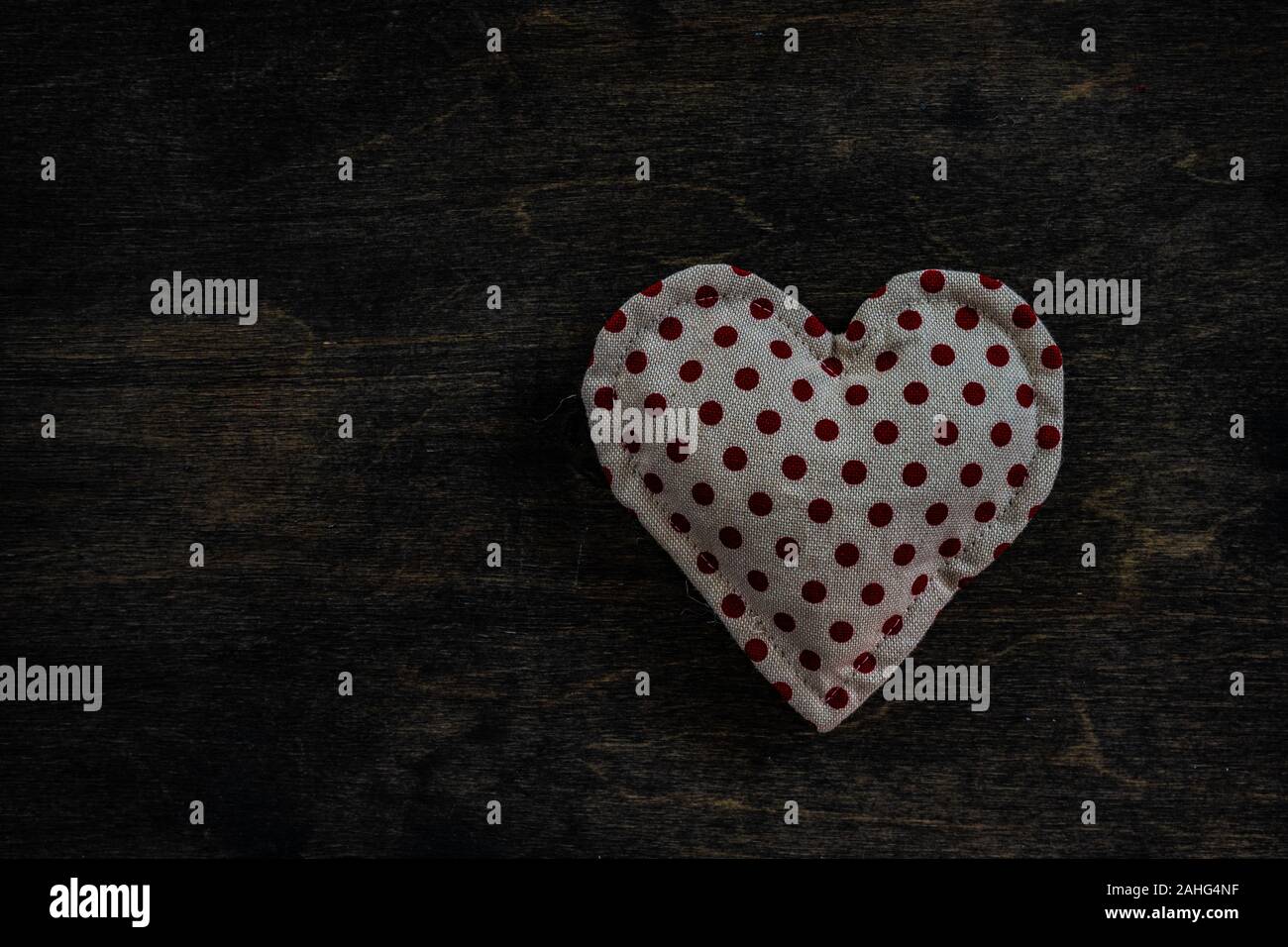 St. Valentine card concept with heart shaped decor on wooden background ...