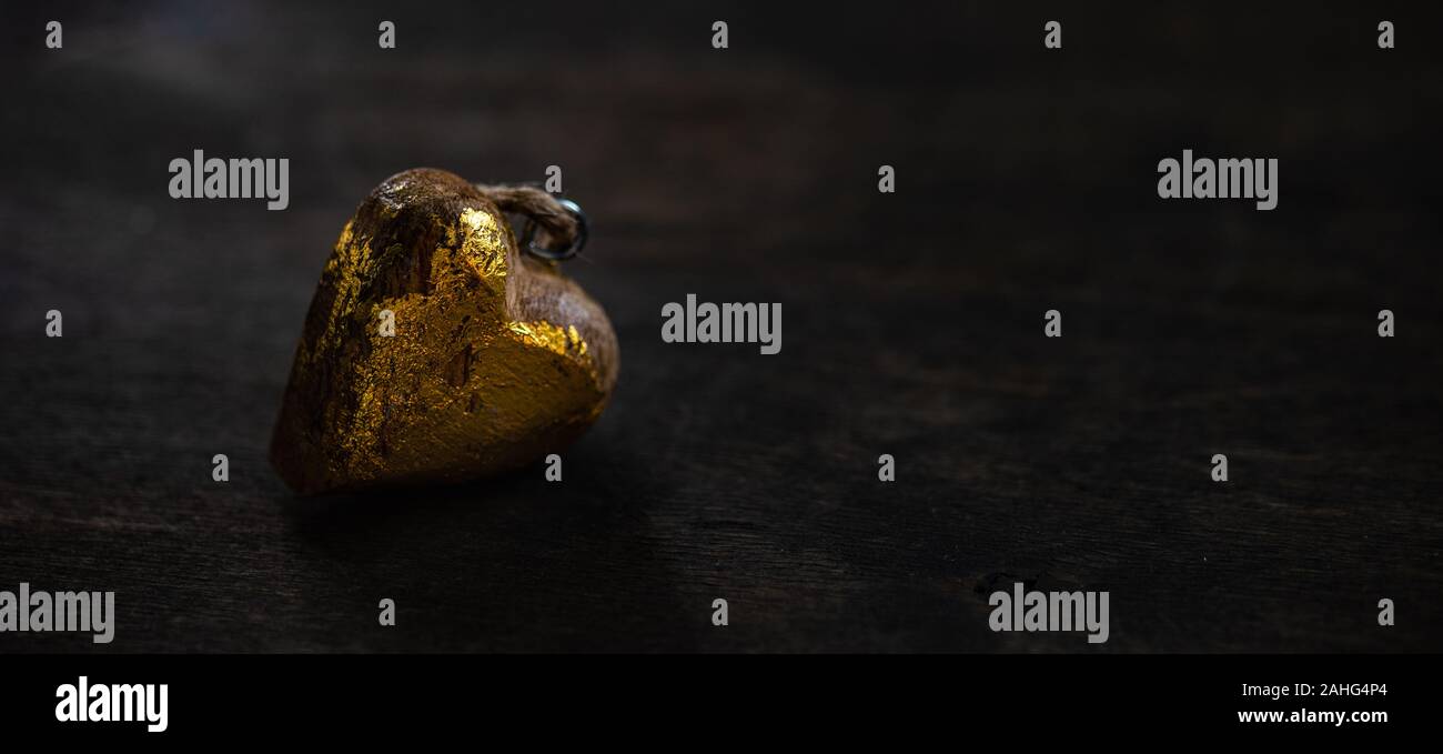 St. Valentine card concept with heart shaped decor on wooden background ...