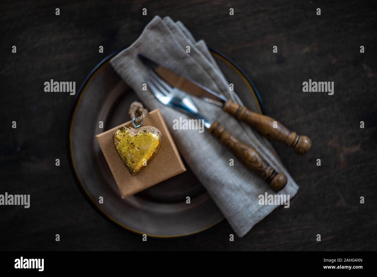St. Valentine card concept with heart shaped decor on wooden background ...