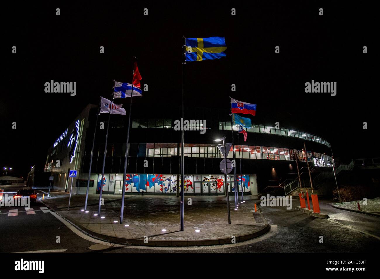The IIHF flag (CW) and the national flags of Finland, Switzerland ...