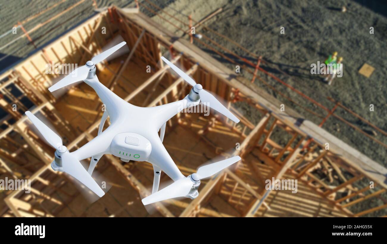 Unmanned Aircraft System Quadcopter Drone In The Air Over Construction ...