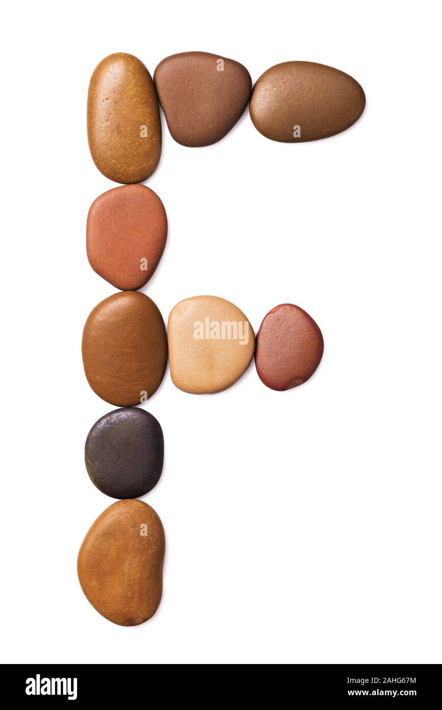 Letter F made of marine small pebbles, top view. Alphabet made of ...