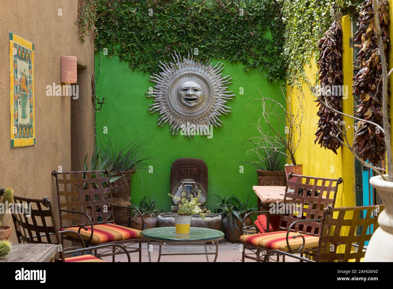 Outdoor courtyard room, southwest style, with green and yellow accent ...