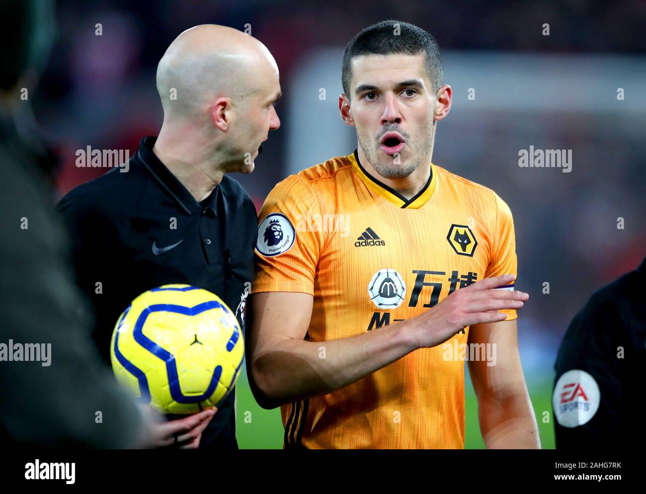 Wolverhampton Wanderers' Conor Coady (right) speaks to Referee Anthony ...