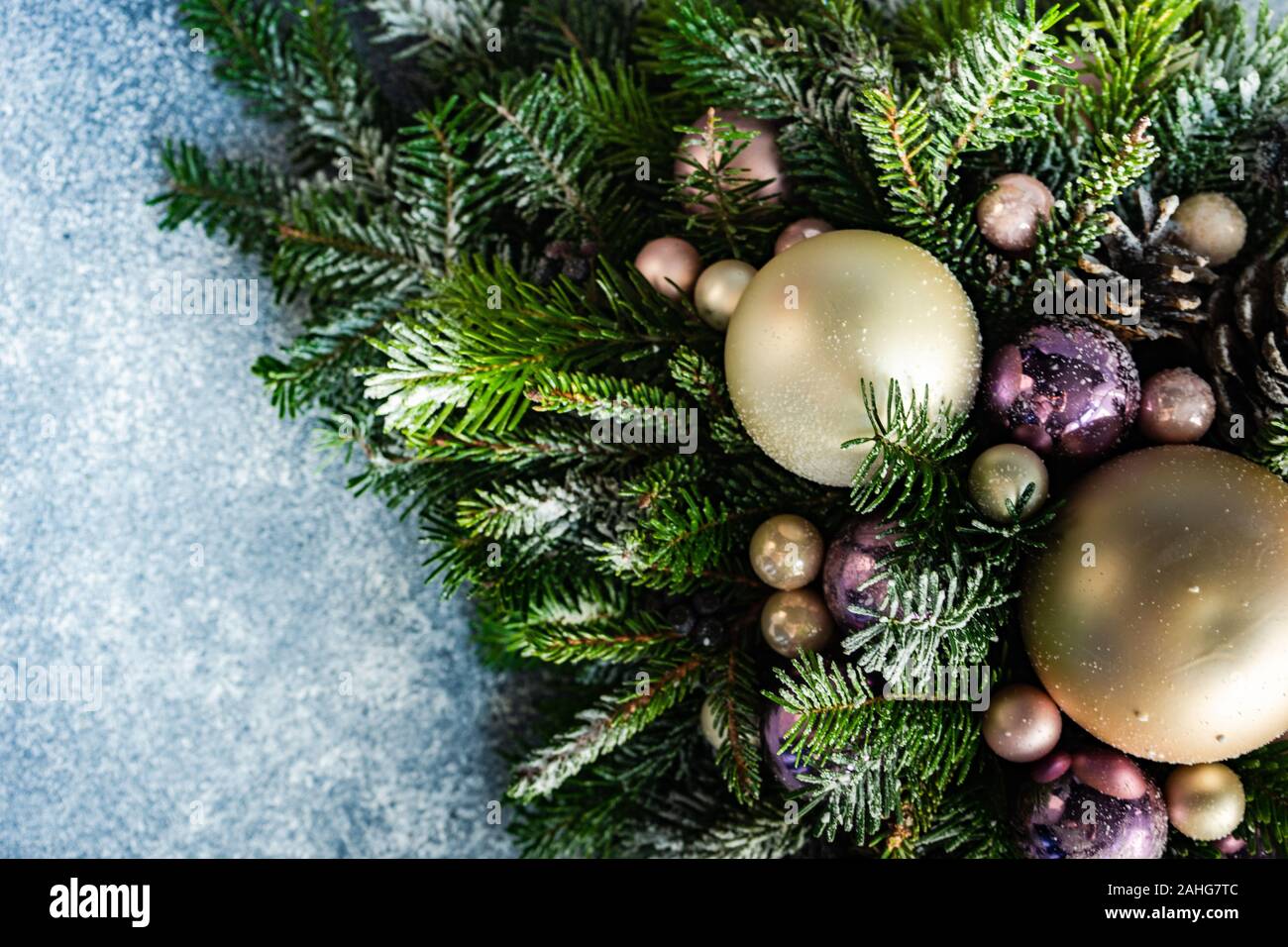 Christmas festive composition with balls and decor on stone background ...