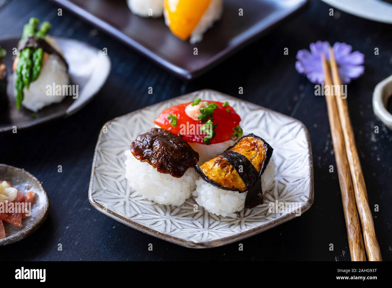 Vegan sushi with tomato, mushroom and asparagus Stock Photo - Alamy