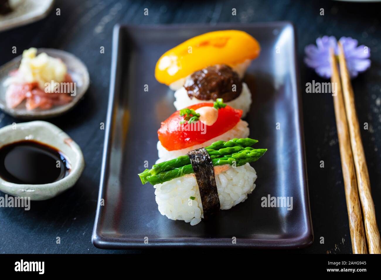 Vegan sushi with tomato, mushroom and asparagus Stock Photo - Alamy