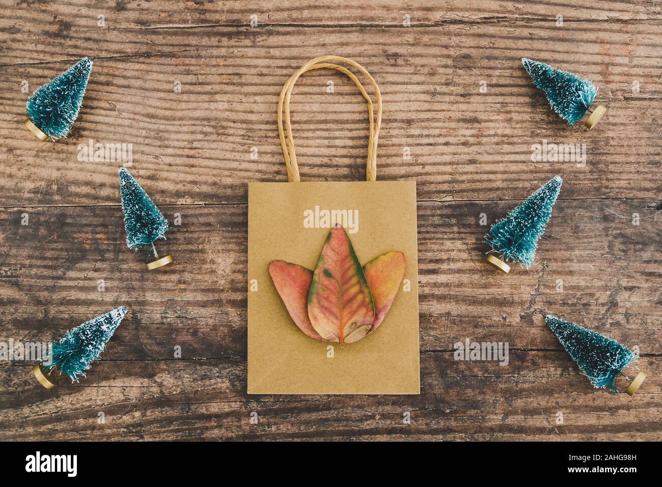 concept of avoiding waste single-use items, paper bags with leaves and ...