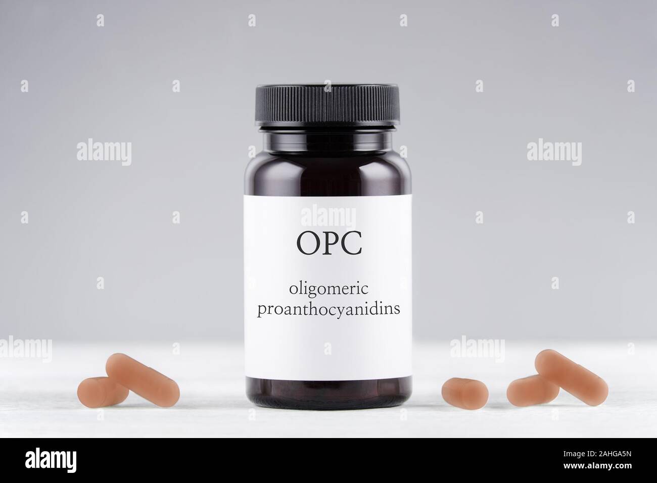 nutritional supplement opc grape seed extract bottle and capsules on ...