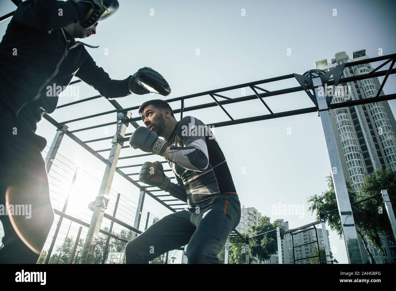 Bending at knees hi-res stock photography and images - Alamy