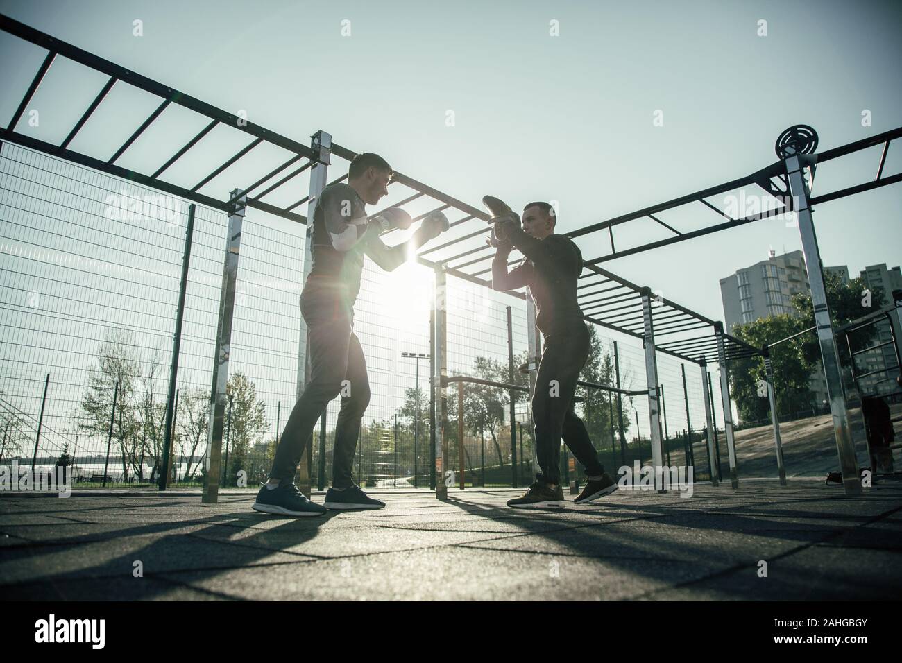 Full length of the boxing training at the modern sports ground Stock ...
