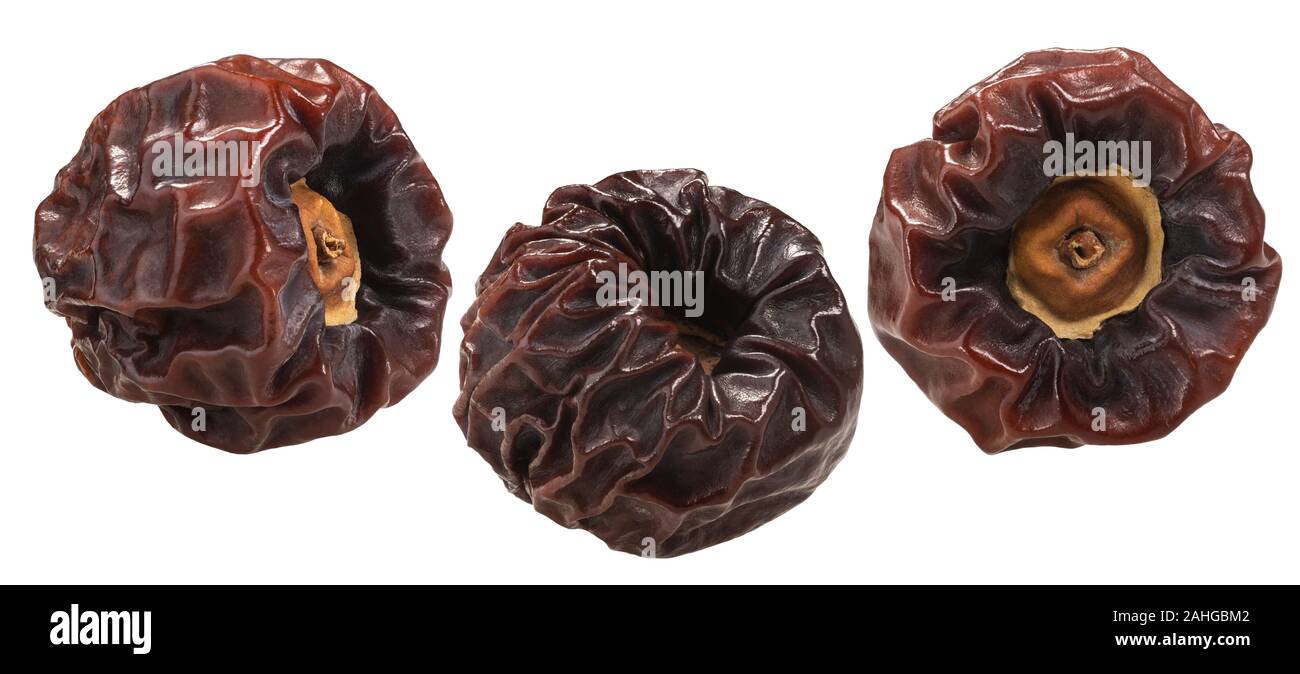 Whole Dried or sun-dried persimmons (Diospyros kaki fruits), isolated ...