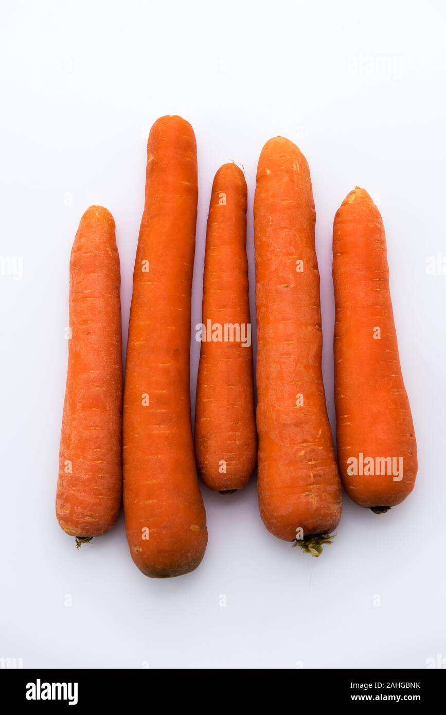 Fresh organic carrots layout isolated on a white background Stock Photo ...
