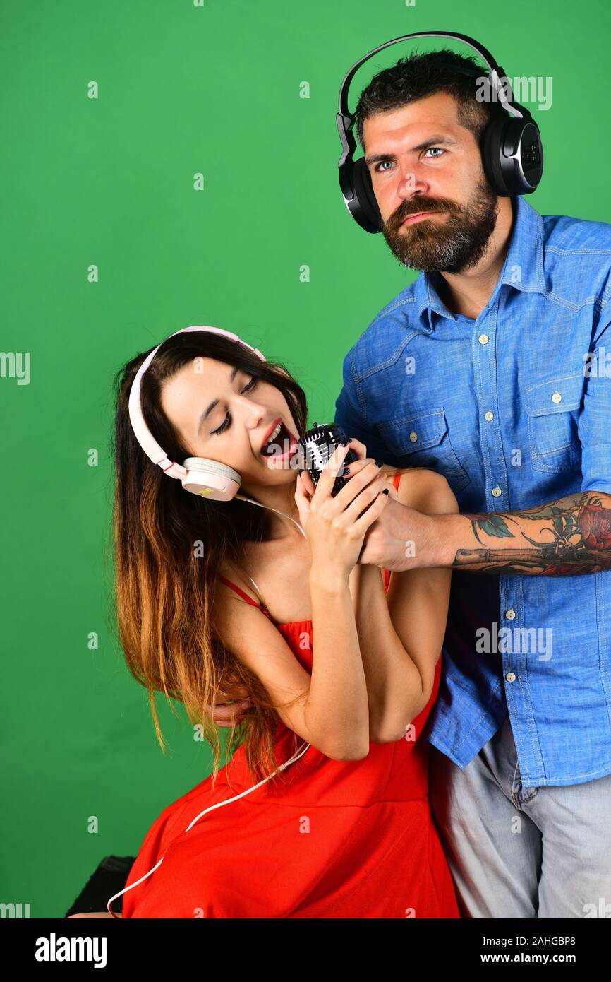 Couple In Love Wears Headphones And Holds Microphone Music Fans With