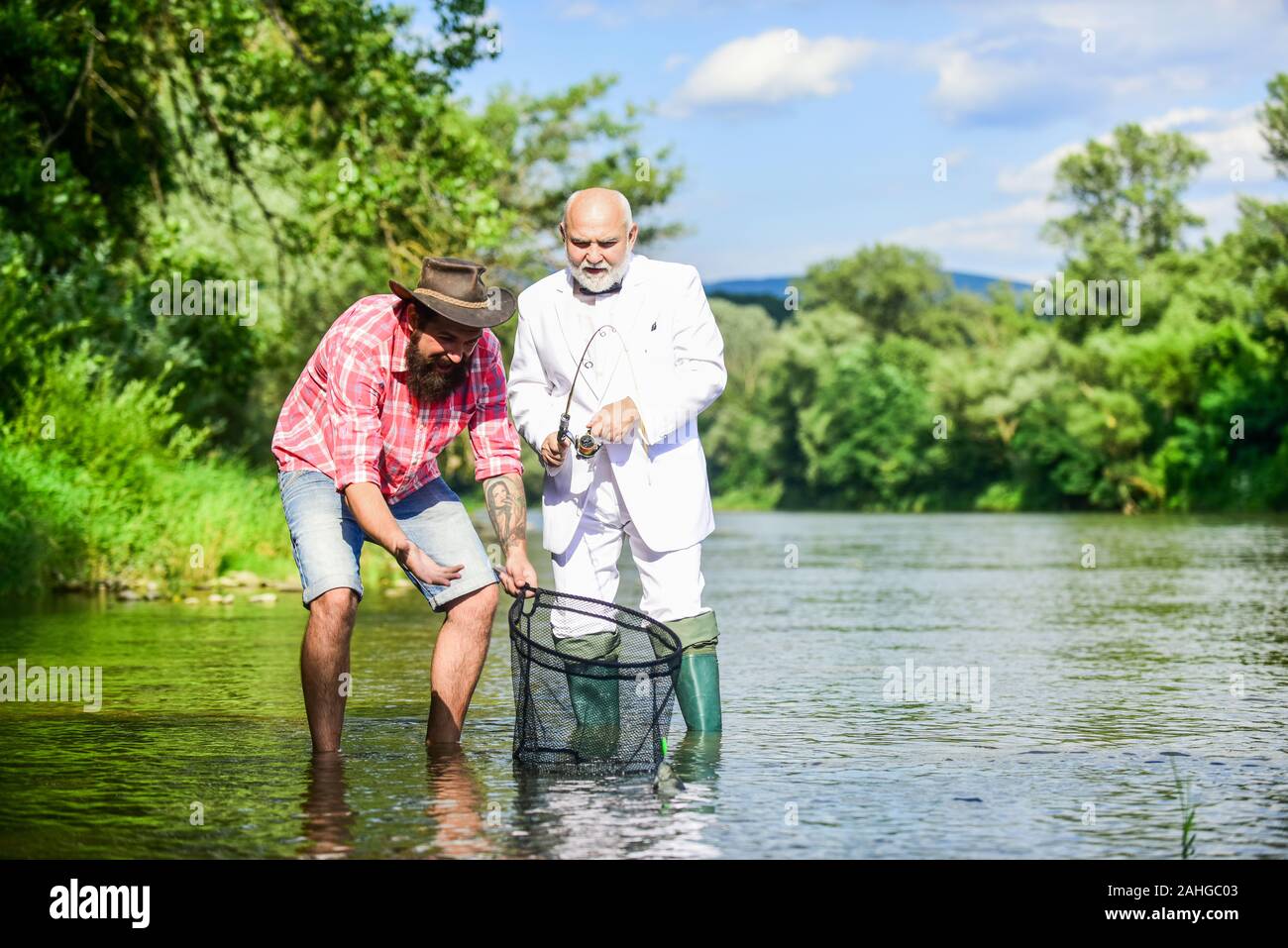Retired fishermen and their families hi-res stock photography and ...