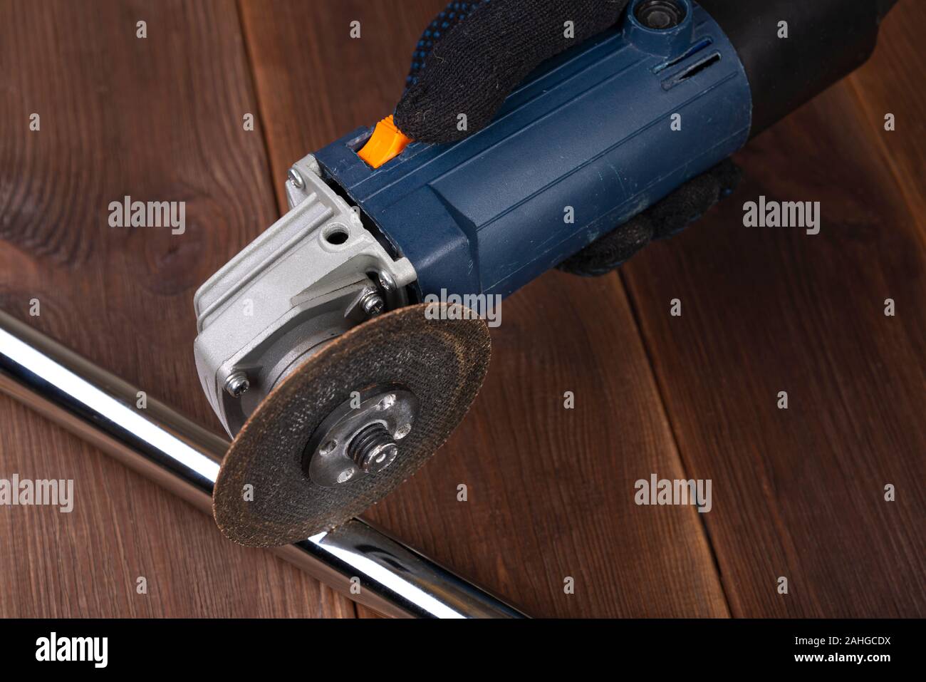 Power tool cutting stainless steel metal tube Stock Photo - Alamy