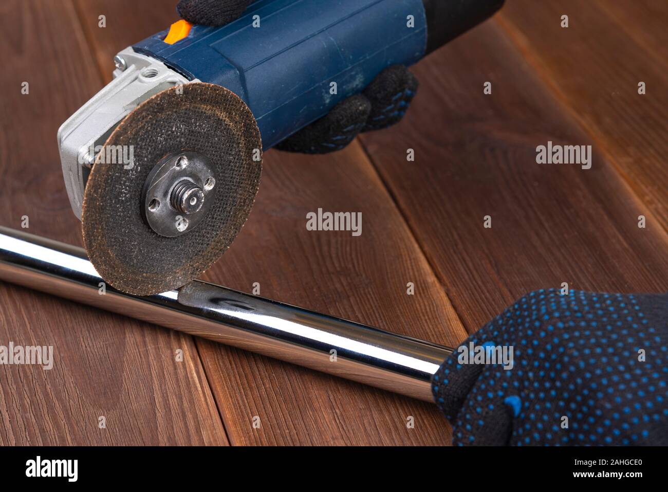 Power tool cutting stainless steel metal tube Stock Photo - Alamy