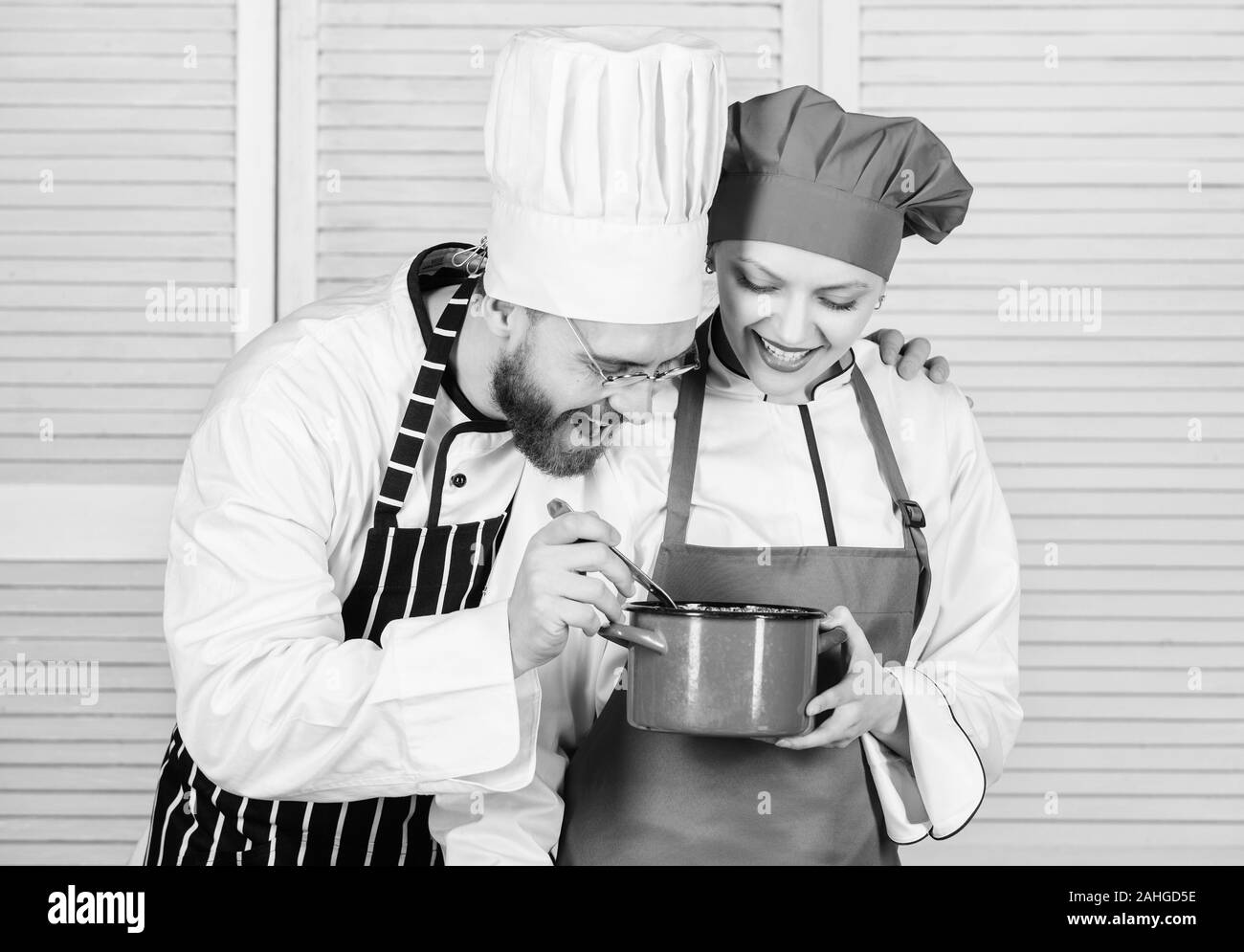 Need some help. Family cooking in kitchen. couple in love with perfect ...