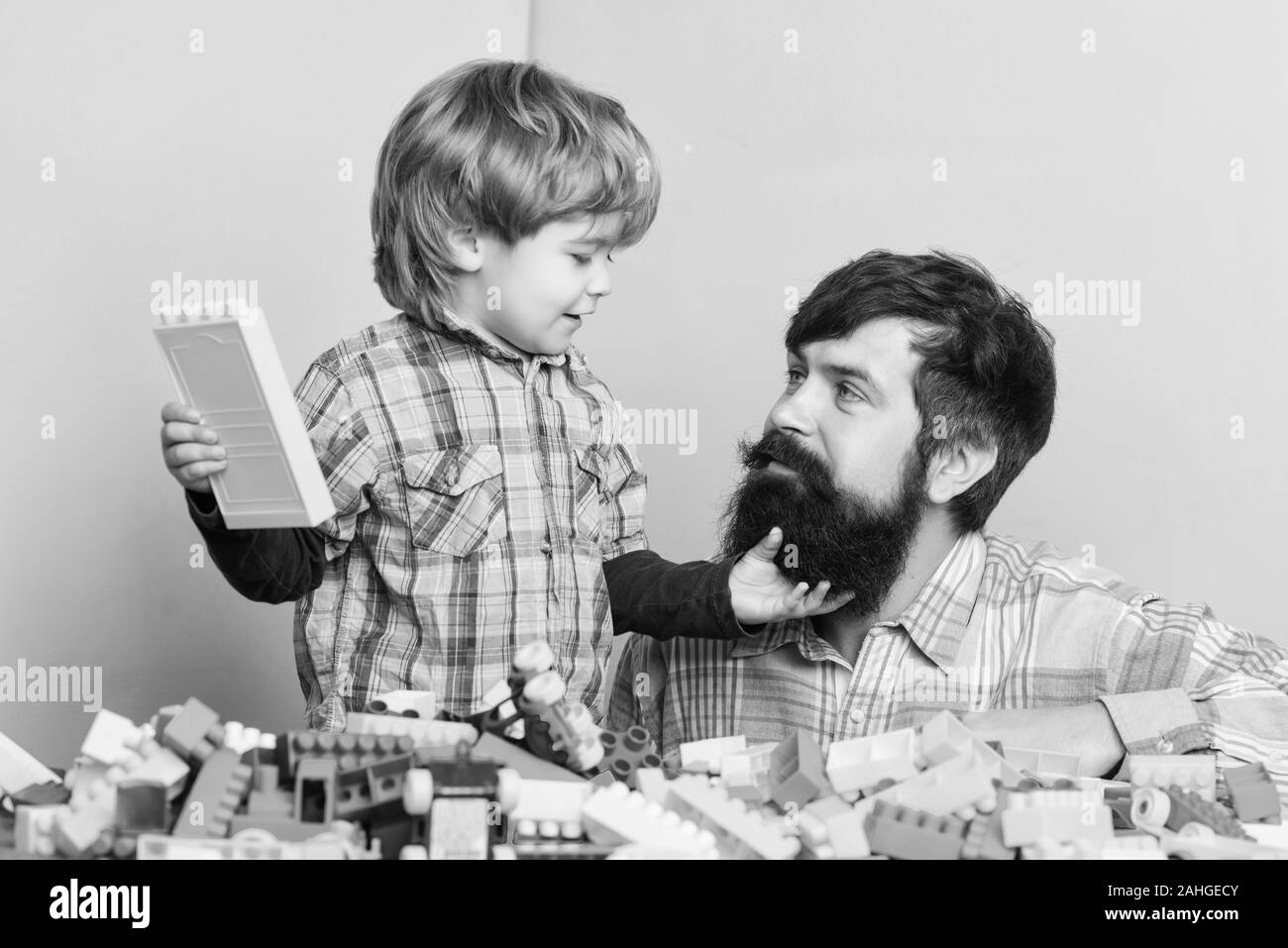 Playing with daddy. building home with constructor. child development ...