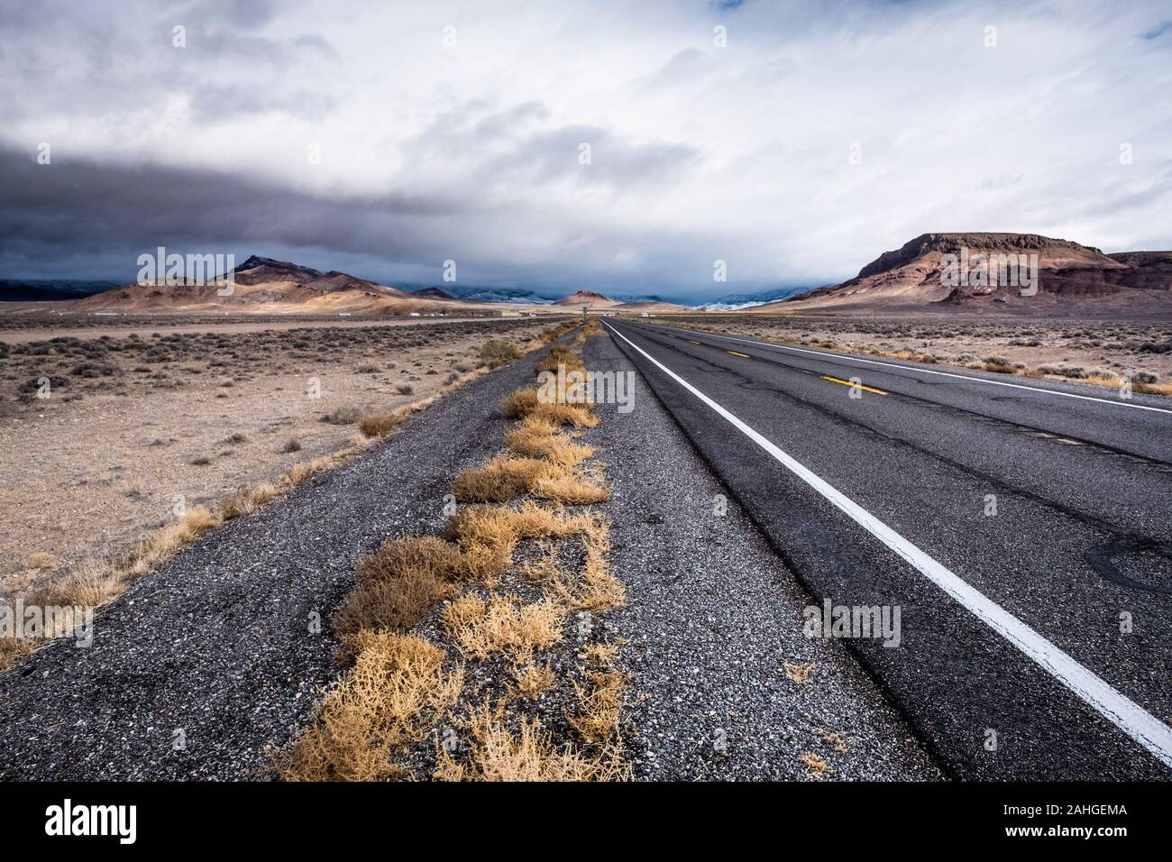 Storm clouds over desert mountains, California, USA Stock Photo - Alamy