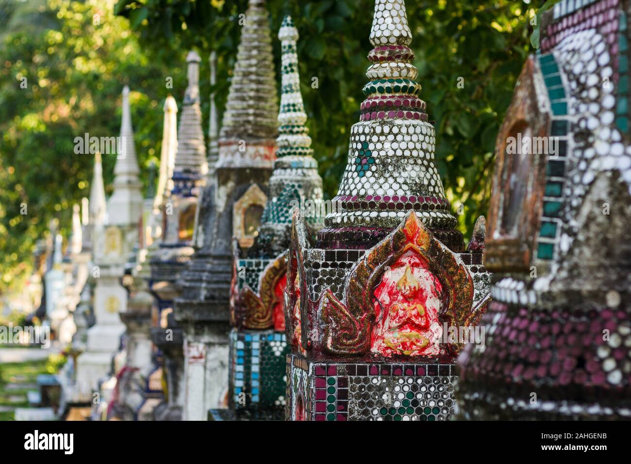 Row of buddhist temple mini stupas of different designs in the island ...