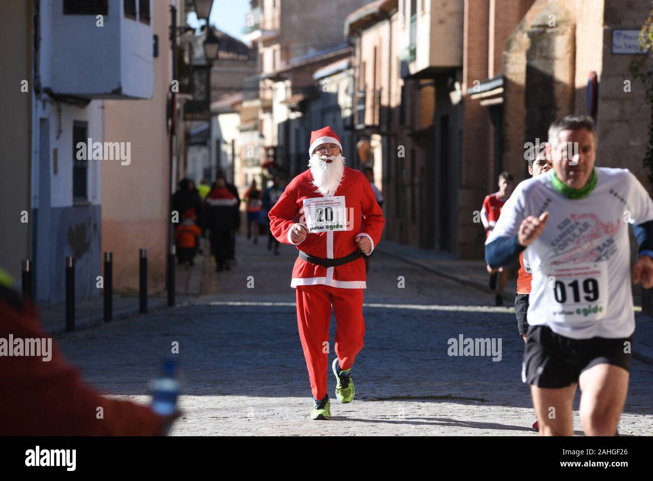 AlmazÃN, Spain. 29th Dec, 2019. A man dressed as Santa Claus takes part ...