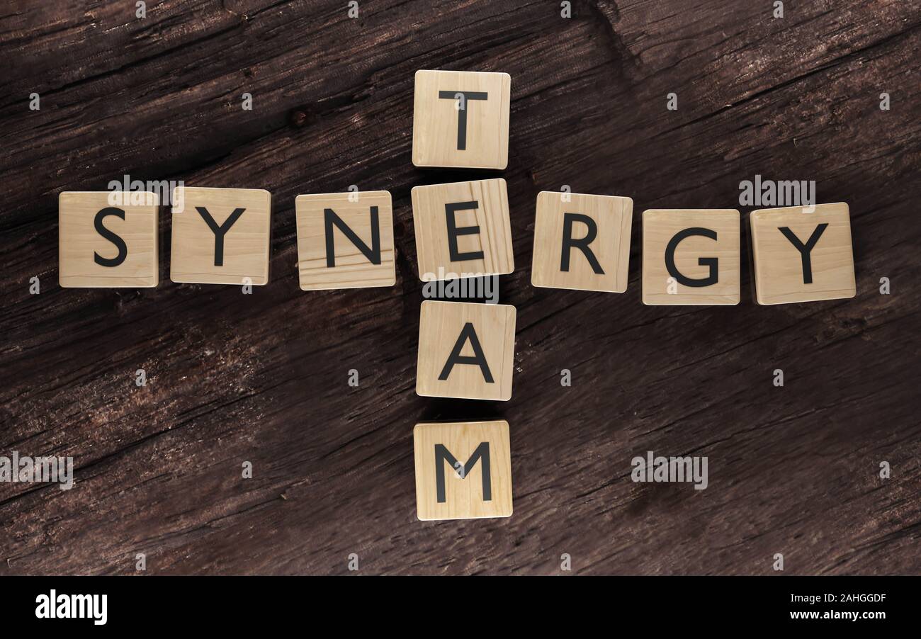 concept art team synergy made of wooden cubes with letters 3d render ...