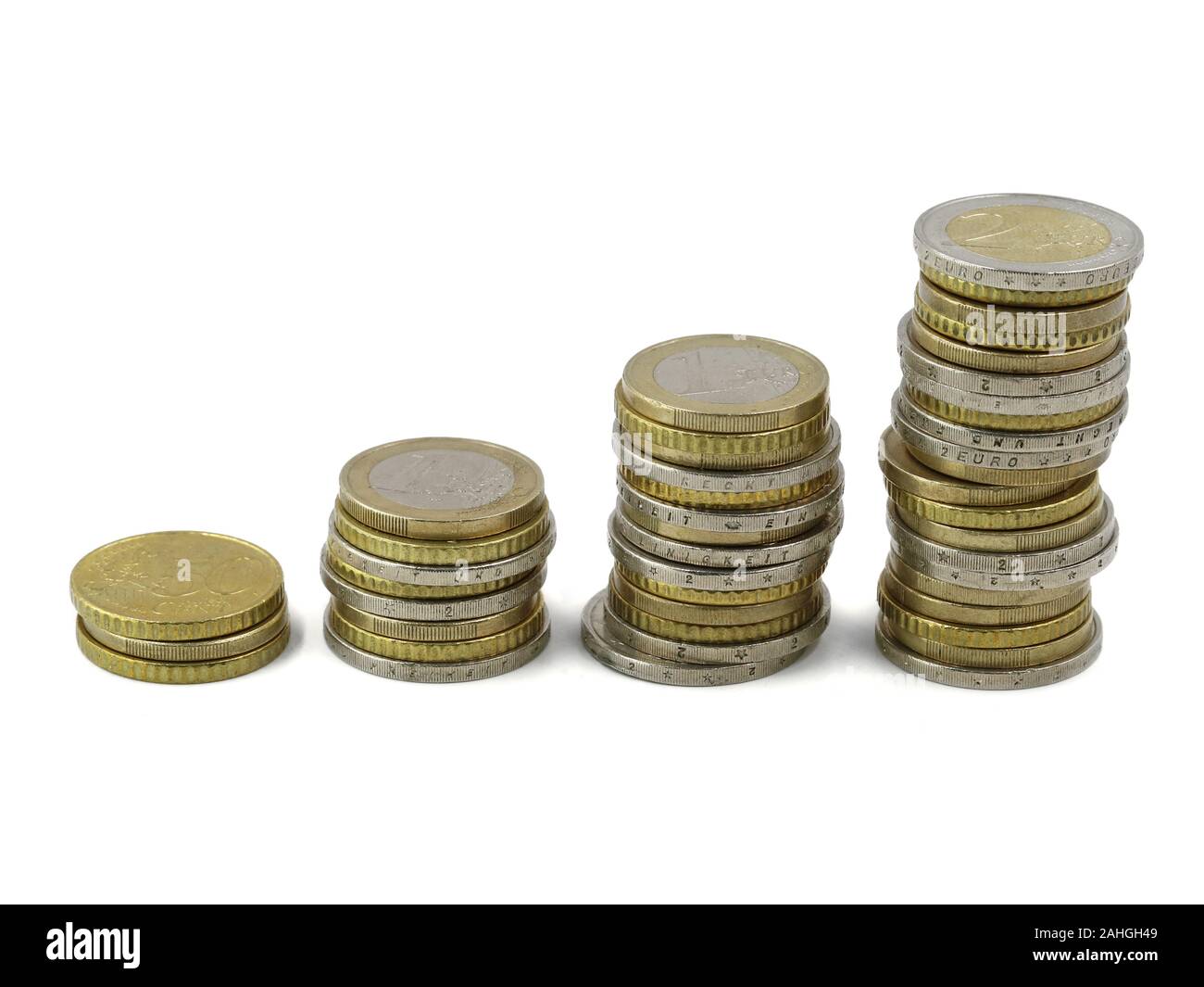 euro coins stacked up in a row isolated on white background Stock Photo ...