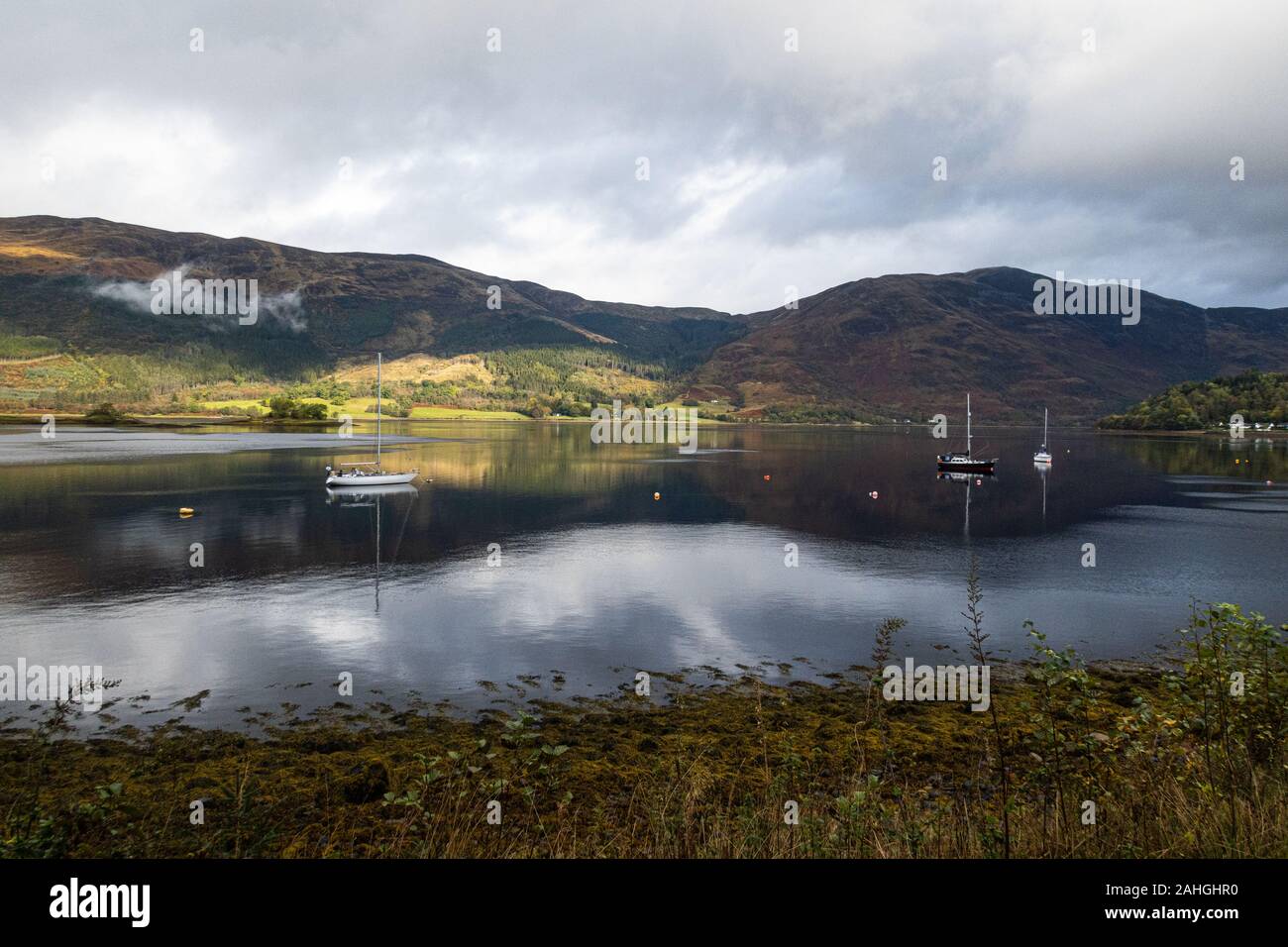Boats at anchor at the former fishing village of Badachro, in the North ...