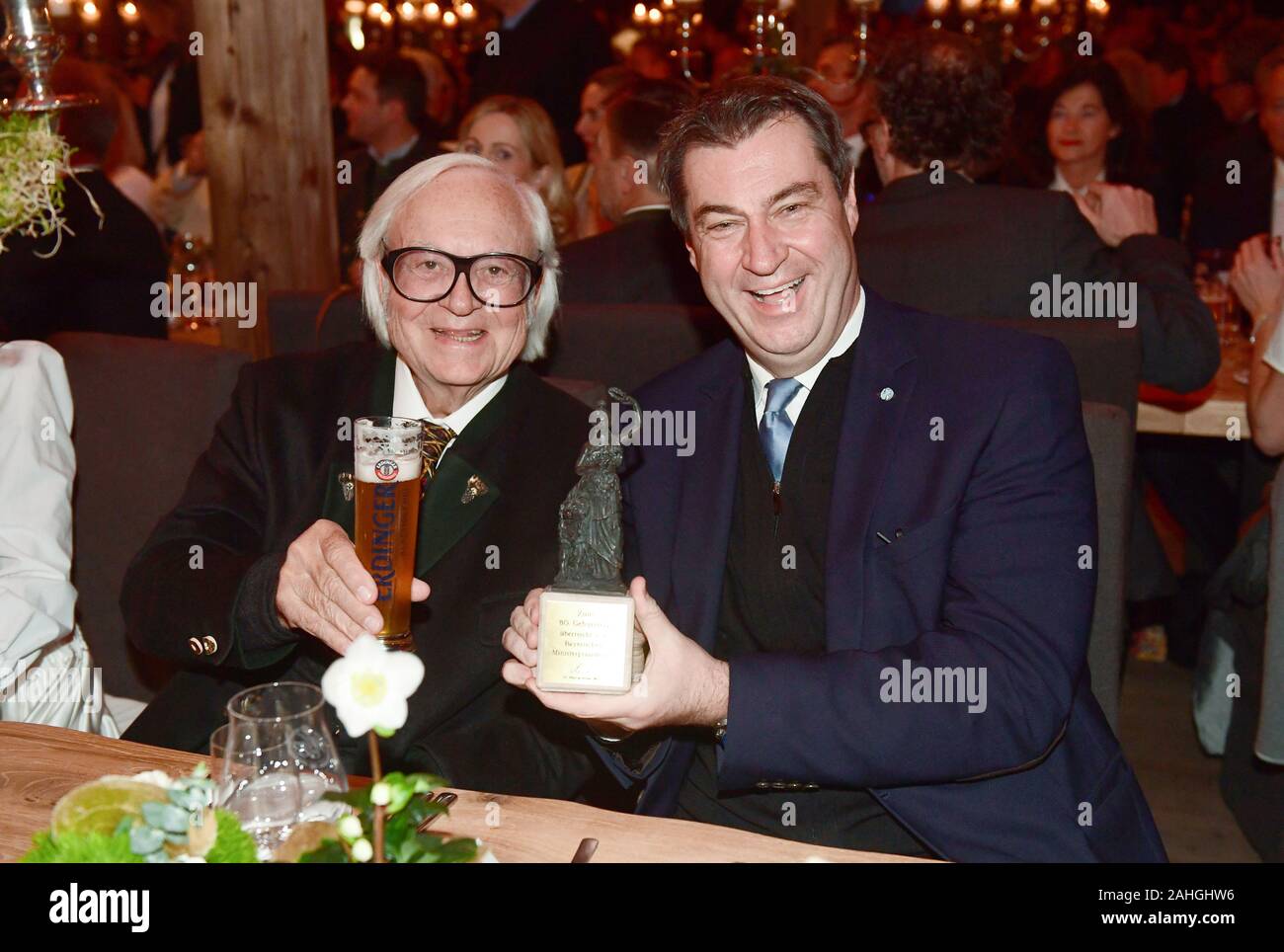 Erding, Germany. 29th Dec, 2019. Werner Brombach (l), owner of Erdinger ...